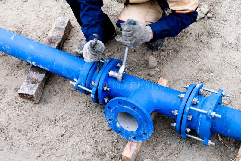 Workers Installing Water Supply Pipeline System, Close Up Stock Image ...