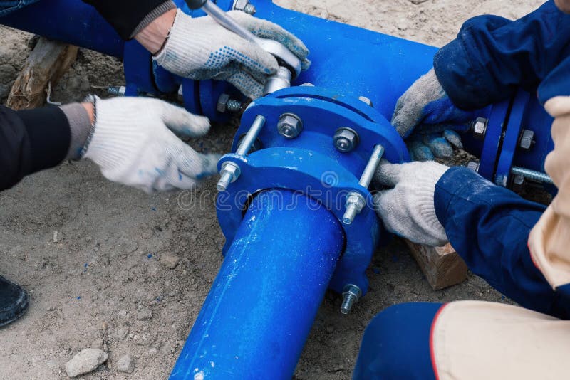 Workers Installing Water Supply Pipeline System, Close Up Stock Photo ...