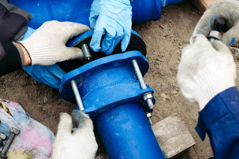 Workers Installing Water Supply Pipeline System, Close Up Stock Image ...