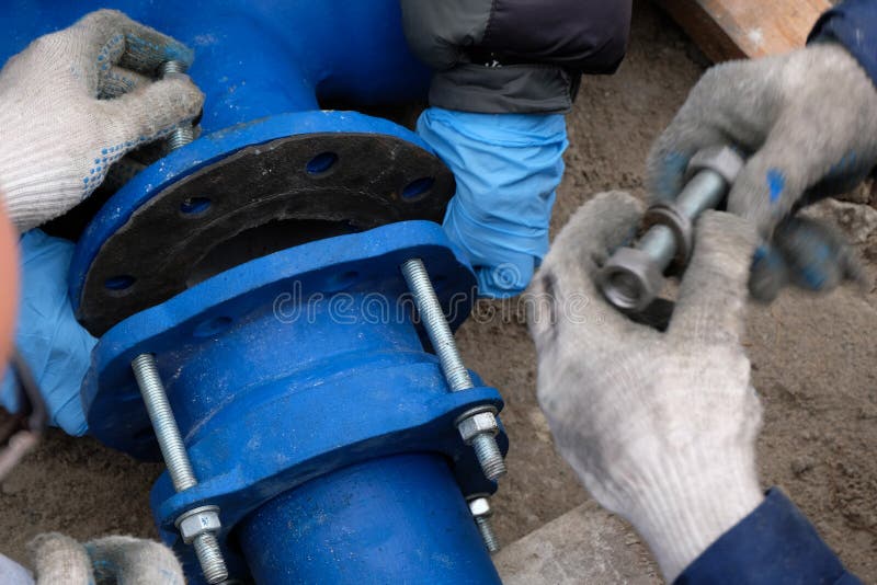 Workers Installing Water Supply Pipeline System, Close Up Stock Photo ...