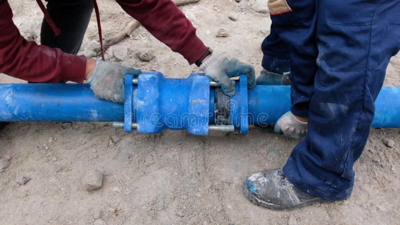 Workers Installing Water Supply Pipeline System, Close Up Stock Video ...