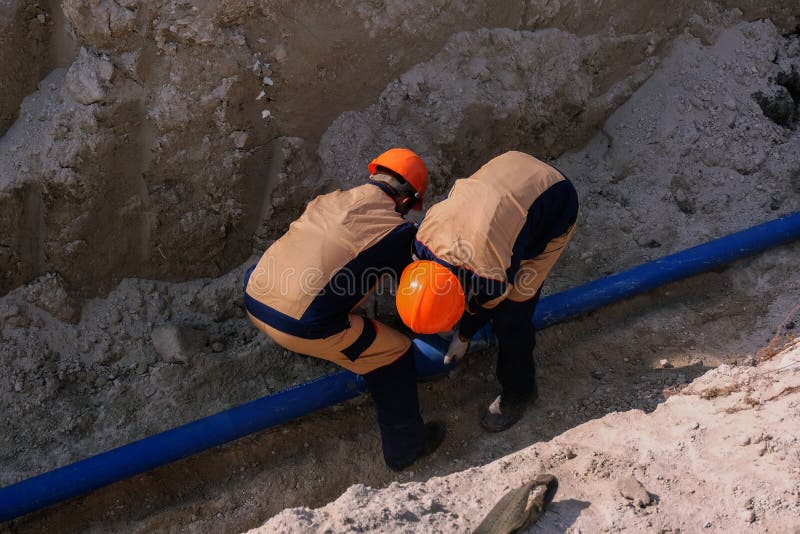 Workers are Installing Water Supply Pipeline System Stock Photo - Image ...