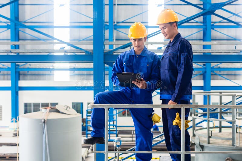 Workers in Large Metal Workshop Checking Work Stock Image - Image of ...