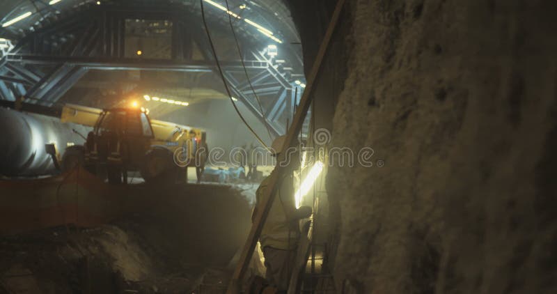 Workers in a Large Scale Tunnel Construction Project Stock Video ...