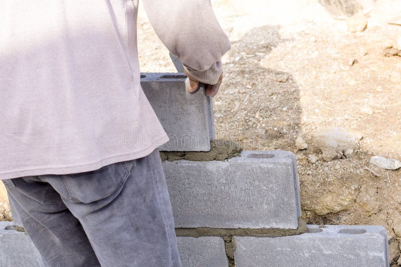 Workers are Laying Blocks of Bricks Stock Image - Image of industrial ...