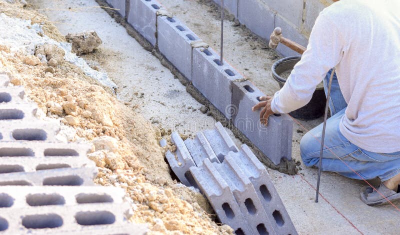 Workers are Laying Blocks of Bricks Stock Image - Image of cement ...