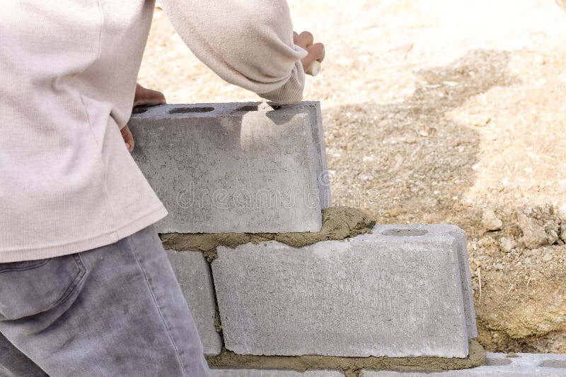 Workers are Laying Blocks of Bricks Stock Photo - Image of installing ...