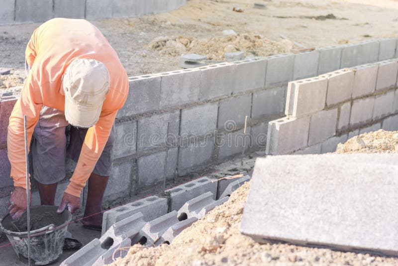Workers are Laying Blocks of Bricks Stock Photo - Image of building ...