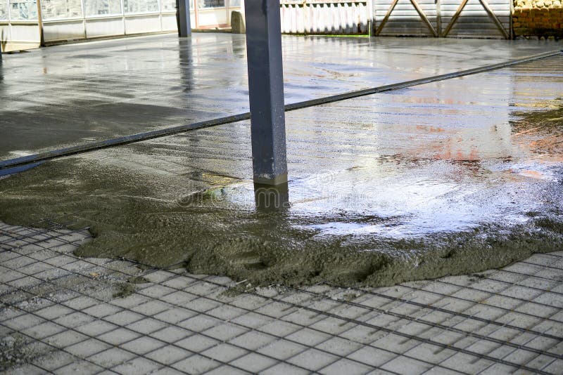 Workers Leveling Concrete of a New Building Stock Image - Image of ...