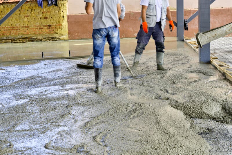 Workers Leveling Concrete of a New Building Stock Image - Image of ...