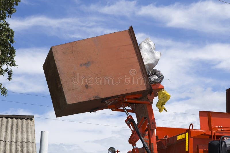 Loading Garbage from the Tank Stock Photo - Image of recycle ...