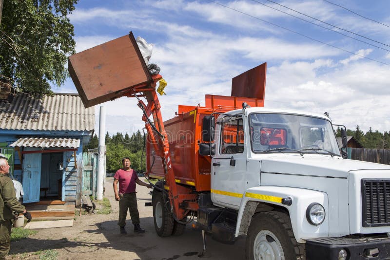 Loading Garbage from the Tank Stock Image - Image of bags, disposal ...