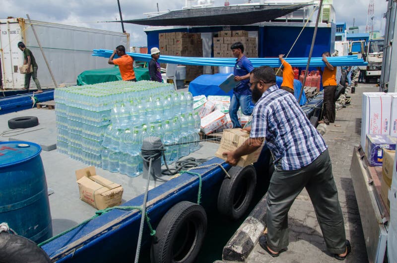 Workers Loading Luggage in the Aircraft Editorial Photography - Image ...