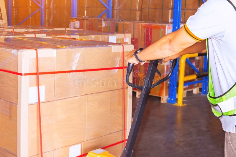 Workers Loading a Package Boxes Pallets in Warehouse. Forklift Pallet ...