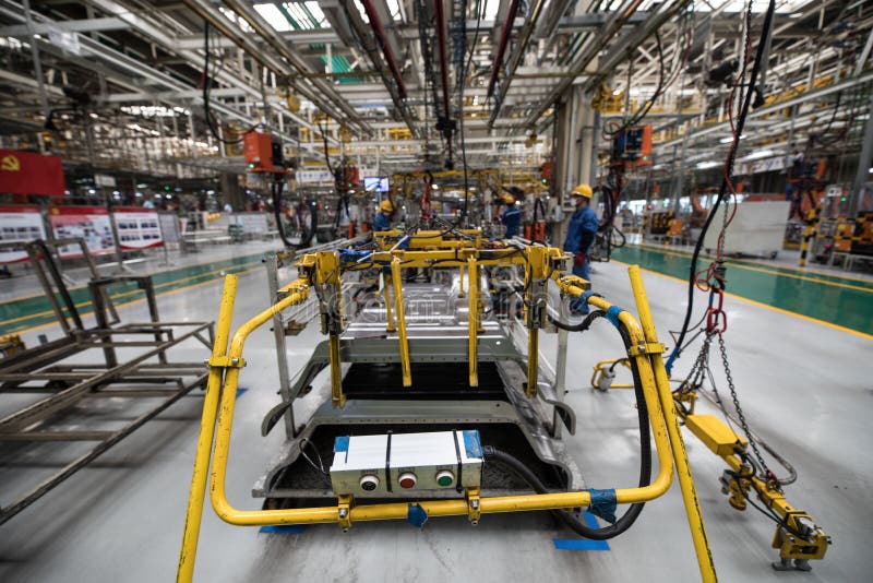 Workers in Machinery Factory in China. Editorial Photo - Image of ...