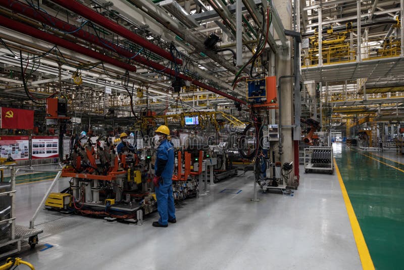 Workers in Machinery Factory in China. Stock Photo - Image of company ...
