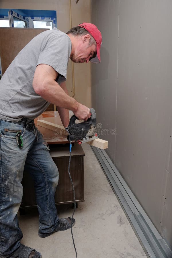 Workers Make Repairs in the Apartment Stock Photo - Image of people ...