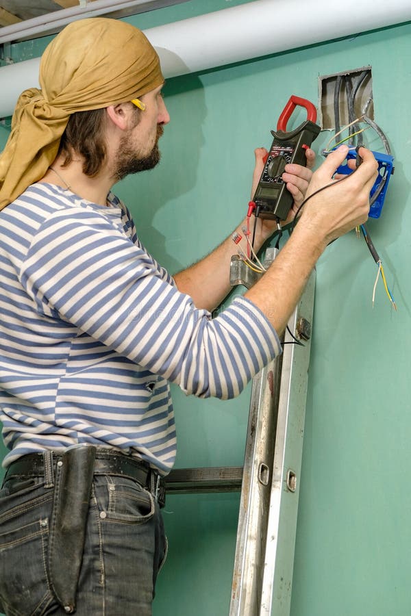 Workers Make Repairs in the Apartment Stock Photo - Image of facility ...