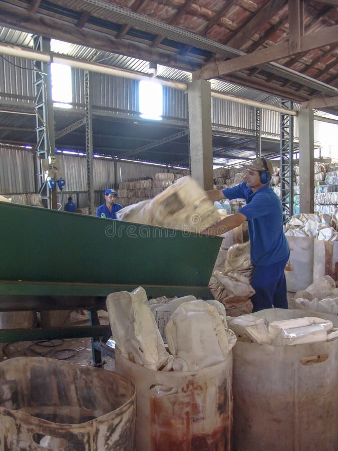 Workers Make the Separation of Plastic Packaging in an Industry ...