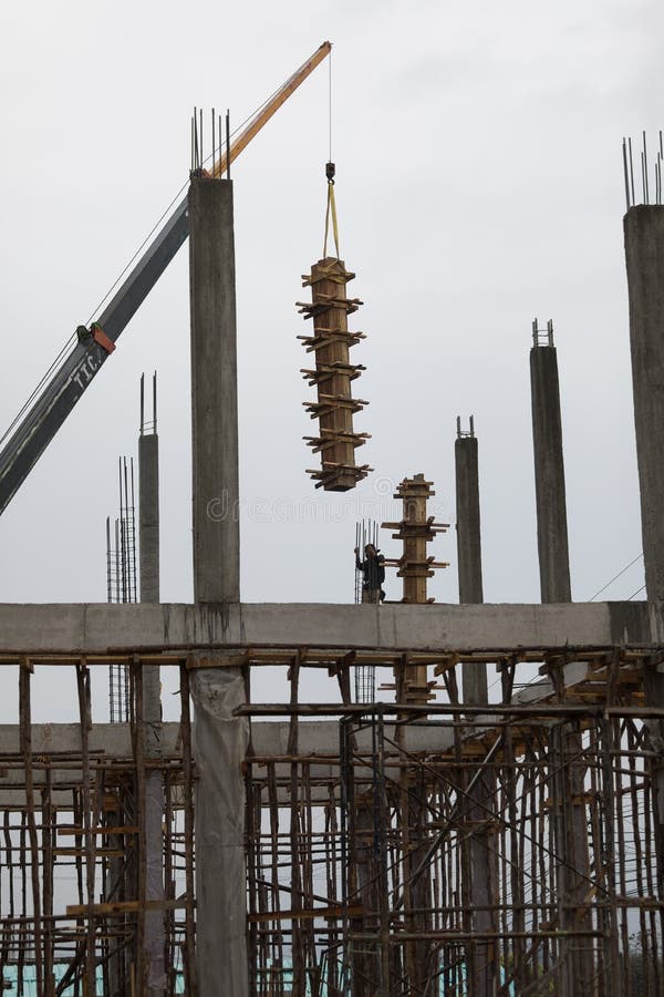Workers Makes Column Box And Keep By Crane For Built Column Editorial ...