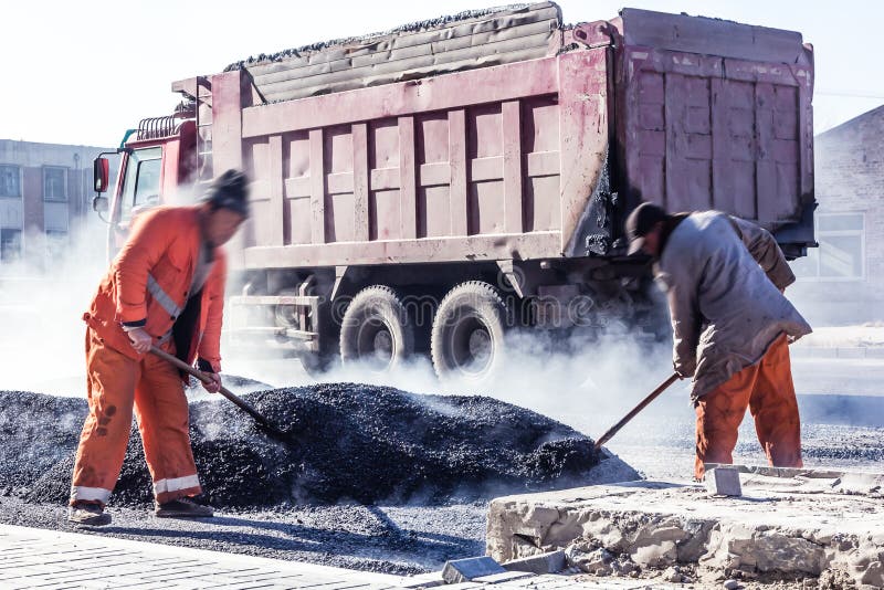 Workers Making Asphalt with Shovels at Road Stock Photo - Image of ...
