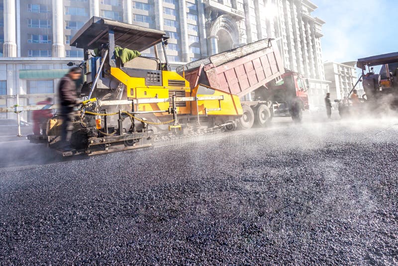 Workers Making Asphalt with Shovels at Road Constructio Stock Photo ...