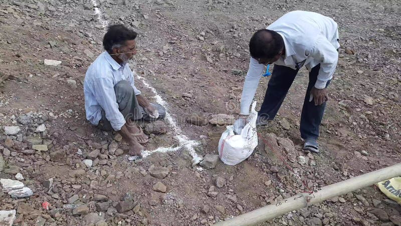 Workers Mark the Ground Floor Layout Column with White Cement - Layout ...