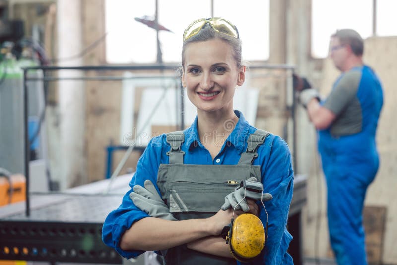 Workers in a Metal Workshop Stock Photo - Image of caucasian, skilled ...