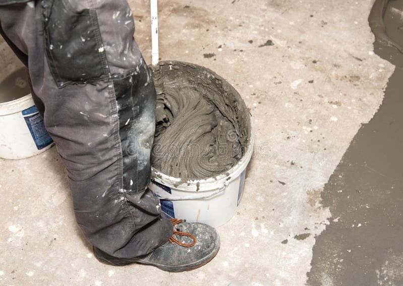 Workers Mixing the Adhesive in Construction Stock Image - Image of ...