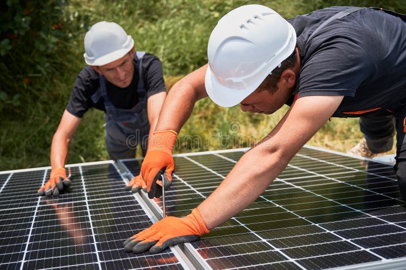 Workers Mounting Photovoltaic Solar Panel System Stock Photo - Image of ...