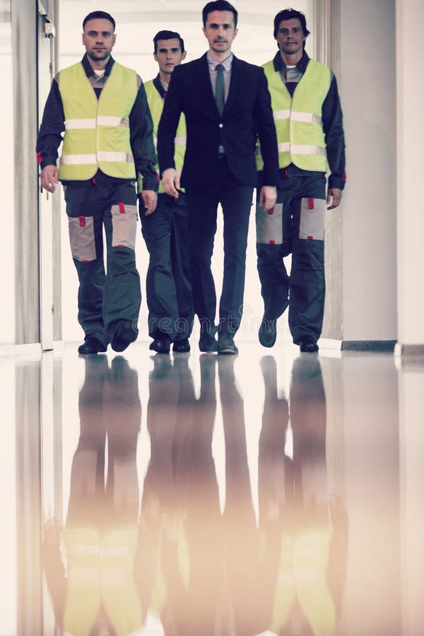 Workers Moving Along the Corridor Stock Image - Image of moving ...
