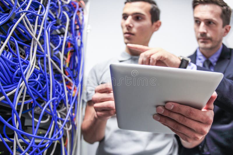 Man in network server room stock photo. Image of professional - 76729550