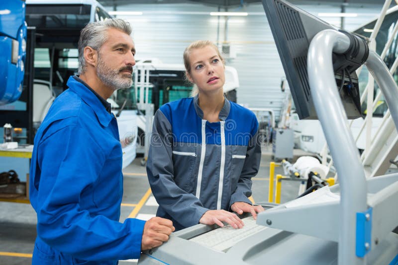 Workers Operating Machine in Factory Stock Image - Image of instrument ...