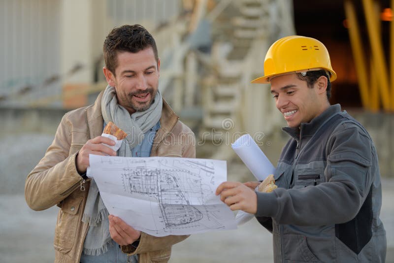 Workers outside a factory stock image. Image of teamwork - 203839395
