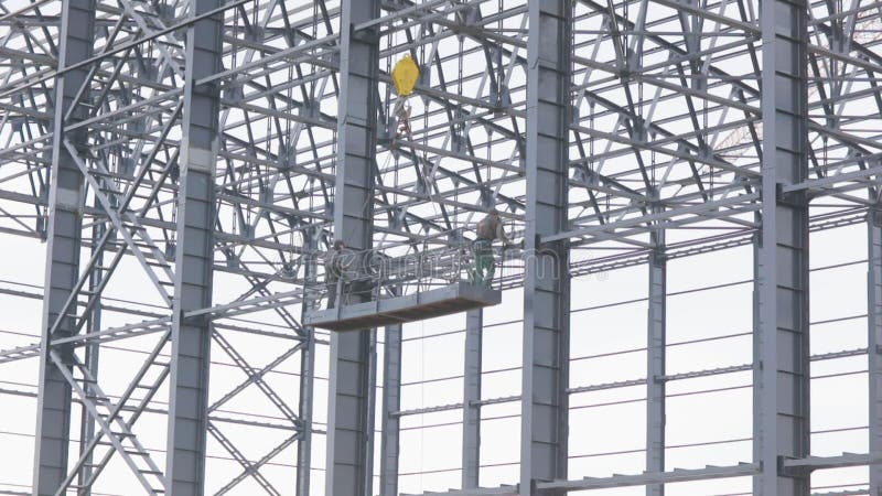 Workers are Painting Metal Structures. Construction Work. Industrial ...