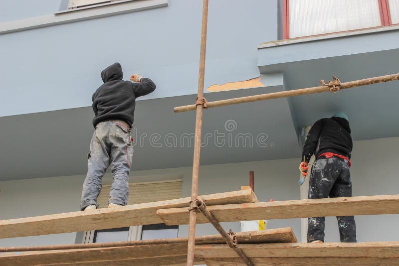Workers Painting and Repairing Facade Stock Image - Image of expertise ...