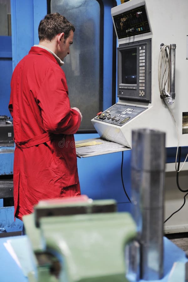 Worker in Manufacturing Plant at Machine Control Panel Stock Photo ...