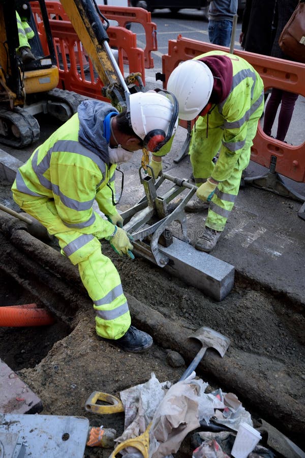 Workers editorial stock photo. Image of pavement, repair - 47003693