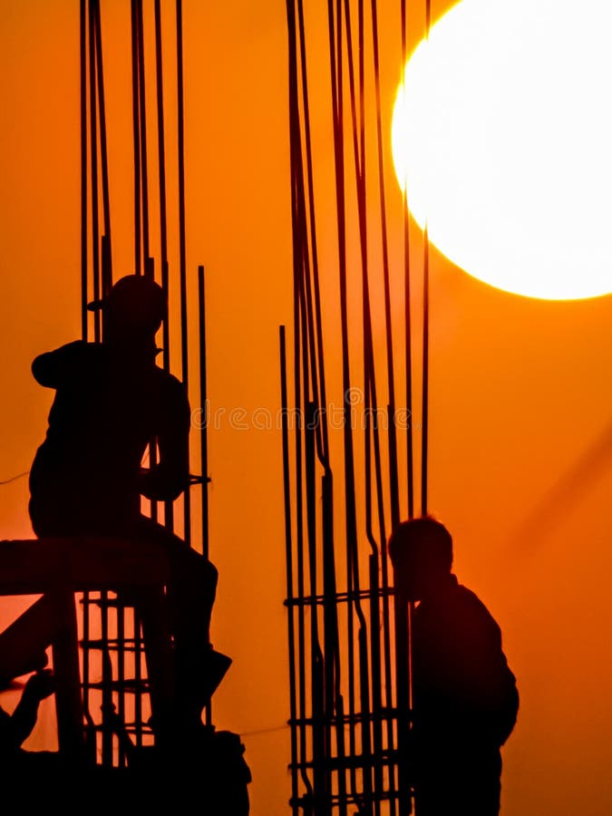 Workers Photo during Sunset Stock Image - Image of shadow, sunlight ...