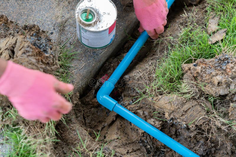 Workers Pipe the Spring Water System Under the Lawn Stock Photo - Image ...