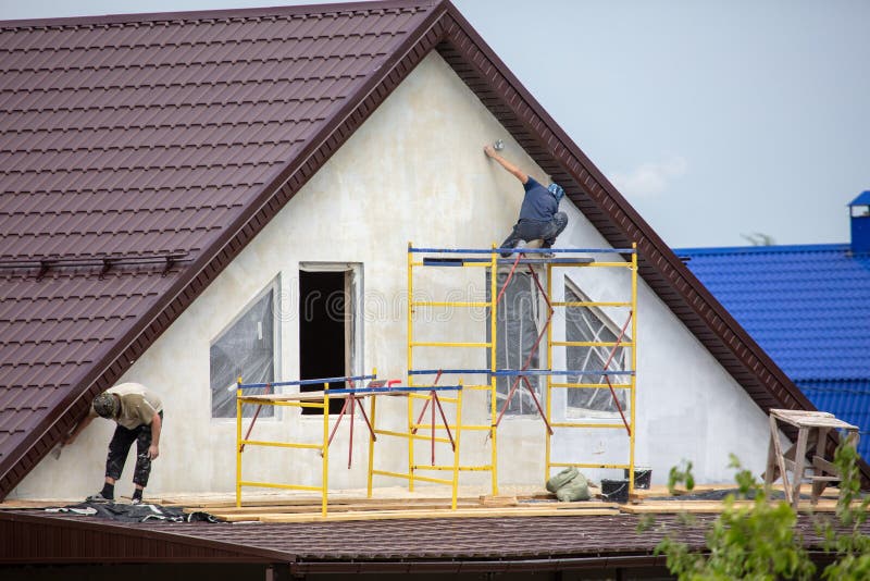 Workers are Plastering the Walls of the House. Editorial Stock Photo ...