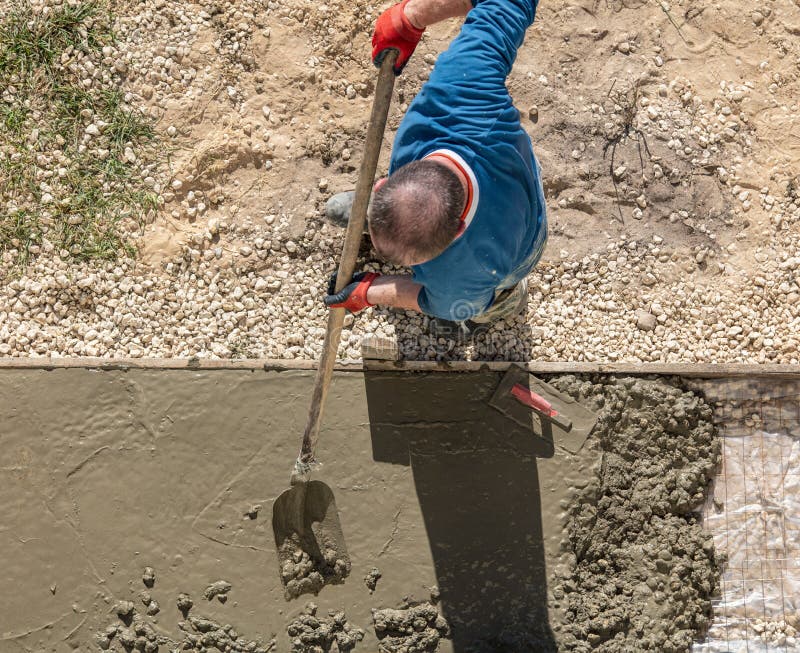Workers Pour Concrete Solution at a Construction Site Editorial Image ...