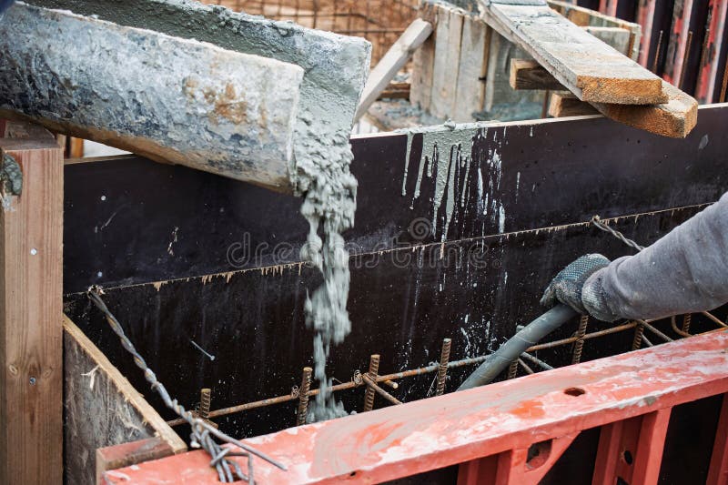 Concrete Pouring Process in a Construction Site during Daylight Hours ...