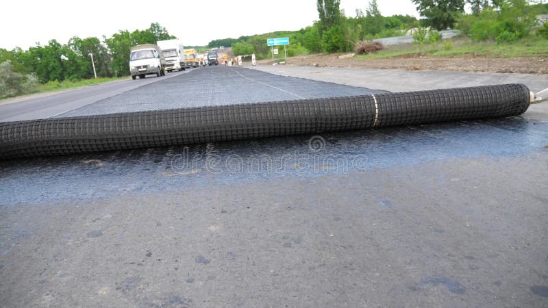 Workers Prepare Surface before Laying a New Layer of Asphalt. Laying a ...