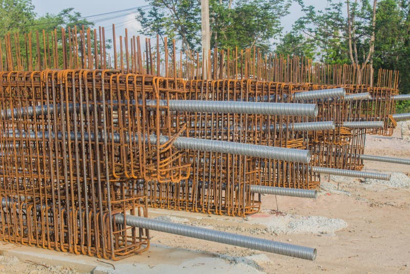 The Workers are Preparing a Steel Construction To Build a New Bridge ...