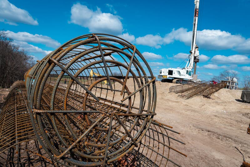 Workers are Preparing a Steel Construction To Build a New Bridge Stock ...