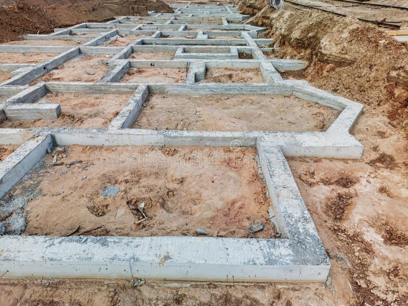 Construction of a Modern Building Foundation with Geometric Shapes at a ...