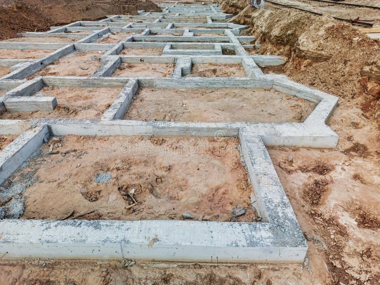 Construction of a Modern Building Foundation with Geometric Shapes at a ...