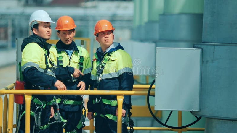 Workers in Production Plant As Team Discussing, Industrial Scene in ...