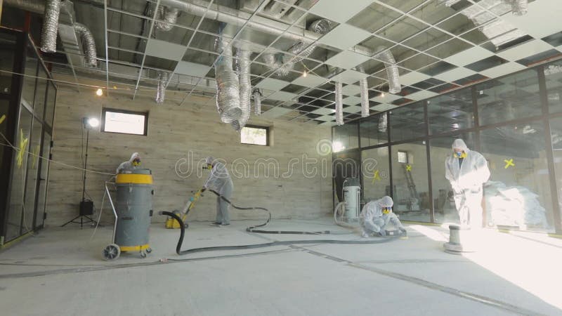 Grinding a Concrete Floor with a Grinder. Concrete Floor Processing ...